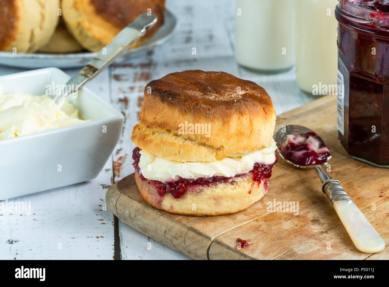 Traditional English scones with strawberry jam and clotted cream Stock ...