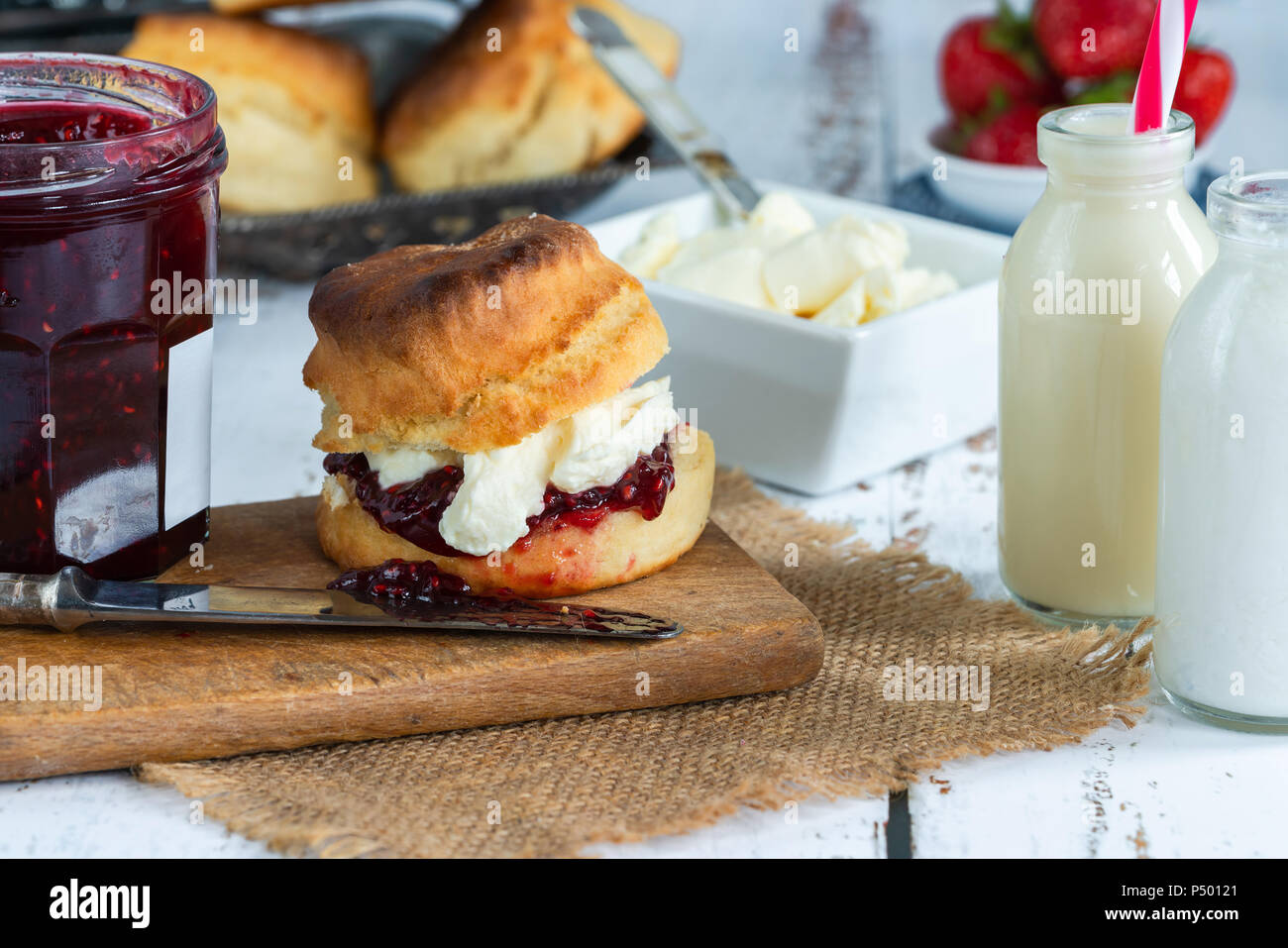 Traditional English scones with strawberry jam and clotted cream Stock ...