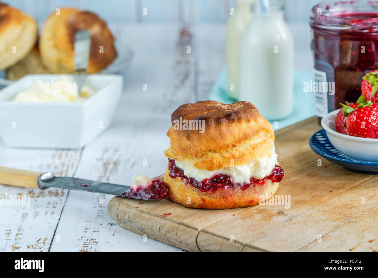 Traditional English scones with strawberry jam and clotted cream Stock ...