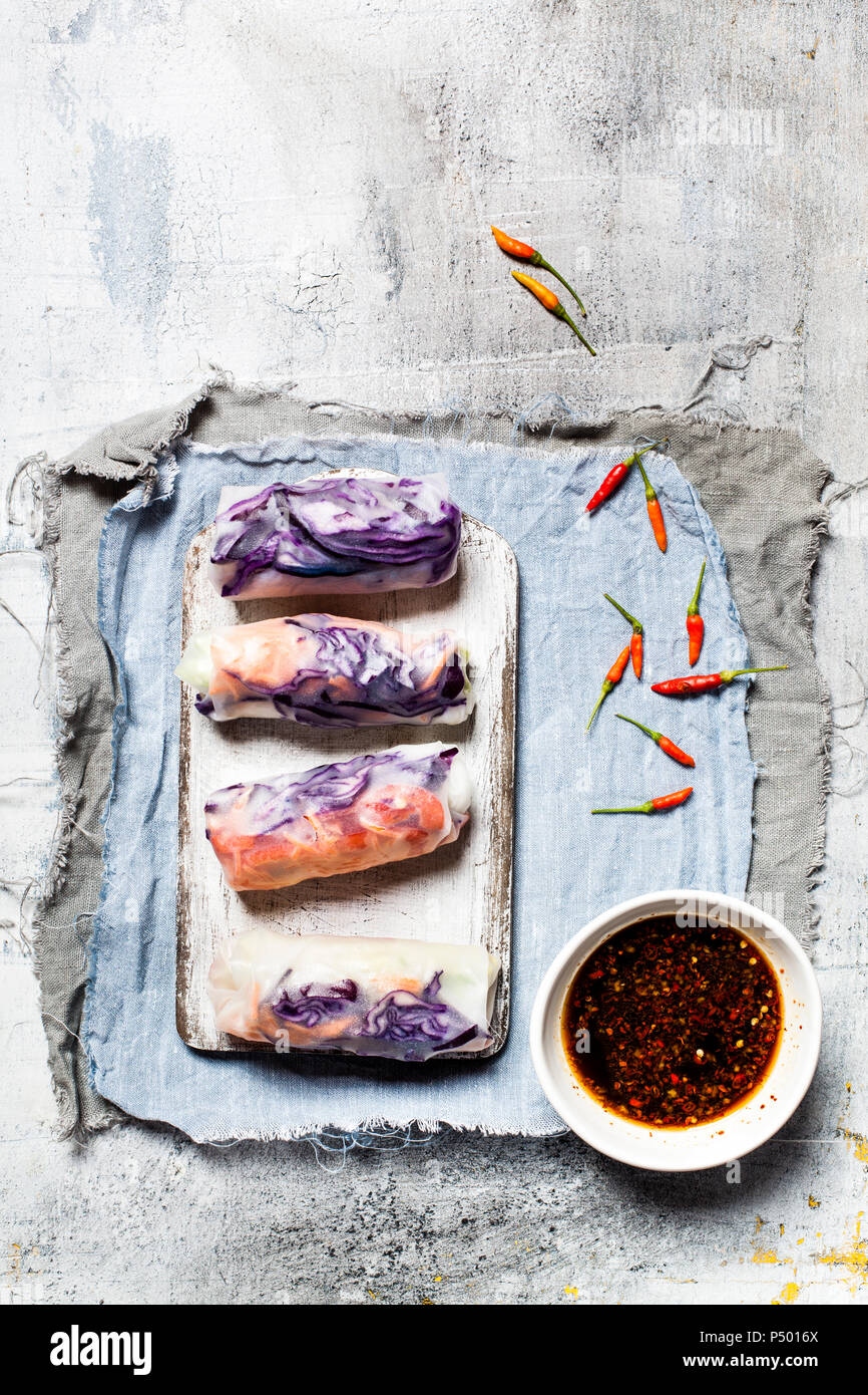 Vegan rice paper wraps (vietnamese summer rolls), filled with cabbage ...