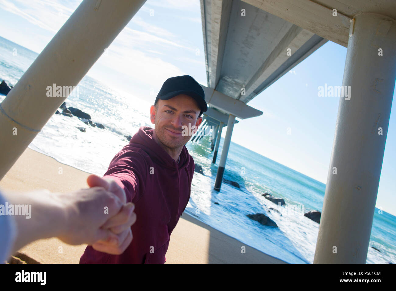 Beach man bridge hi-res stock photography and images - Alamy