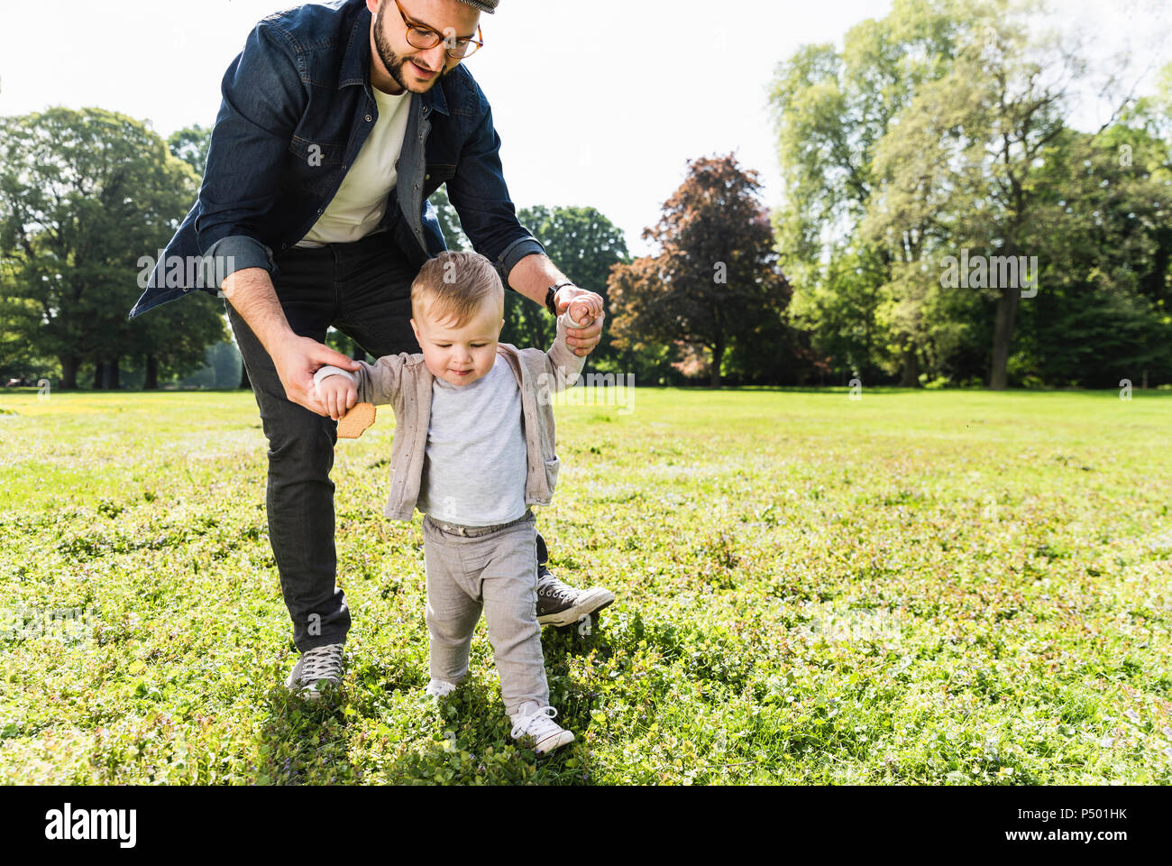 Father and children walk hi-res stock photography and images - Alamy