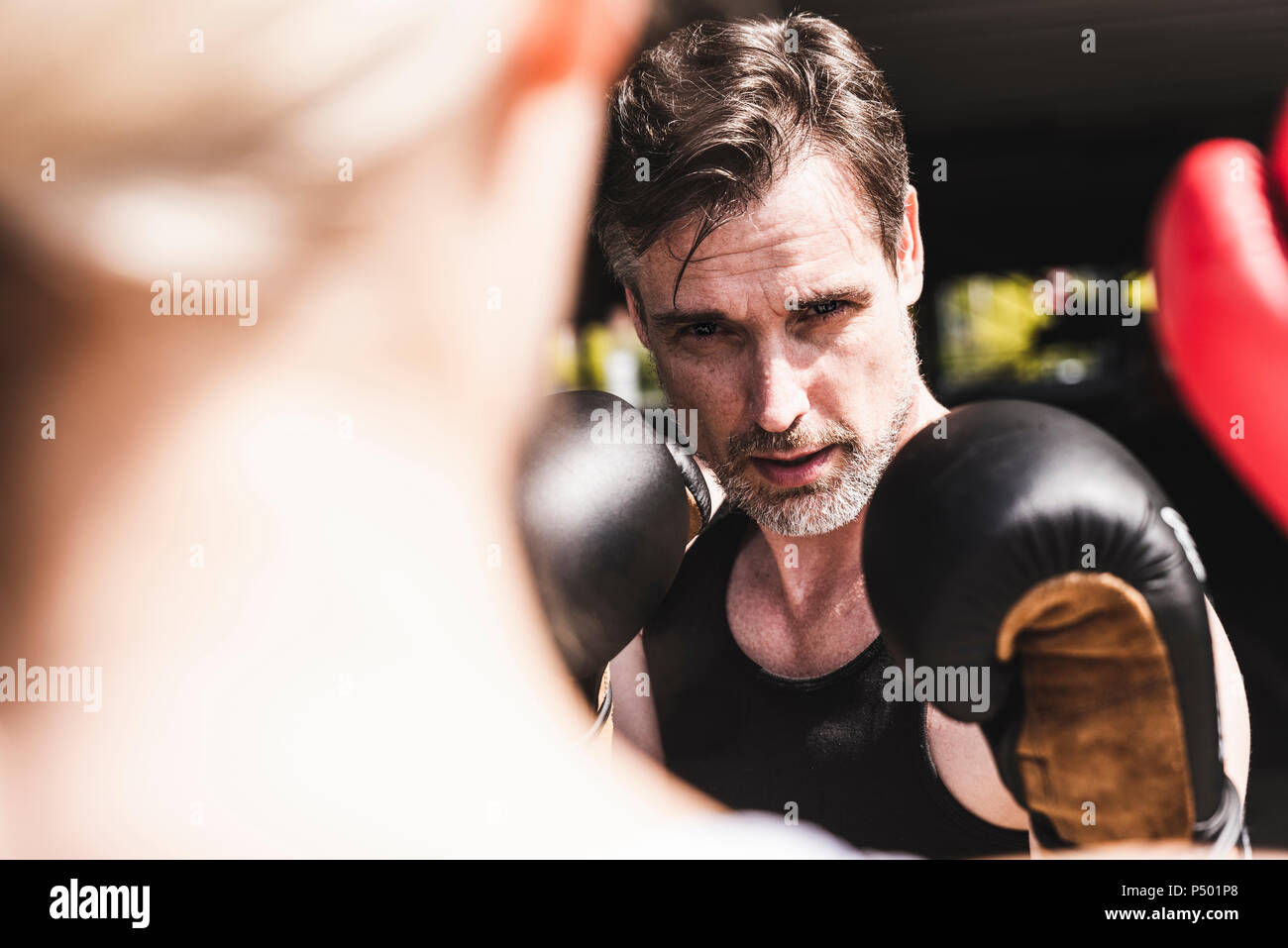Man and woman in boxing training Stock Photo - Alamy