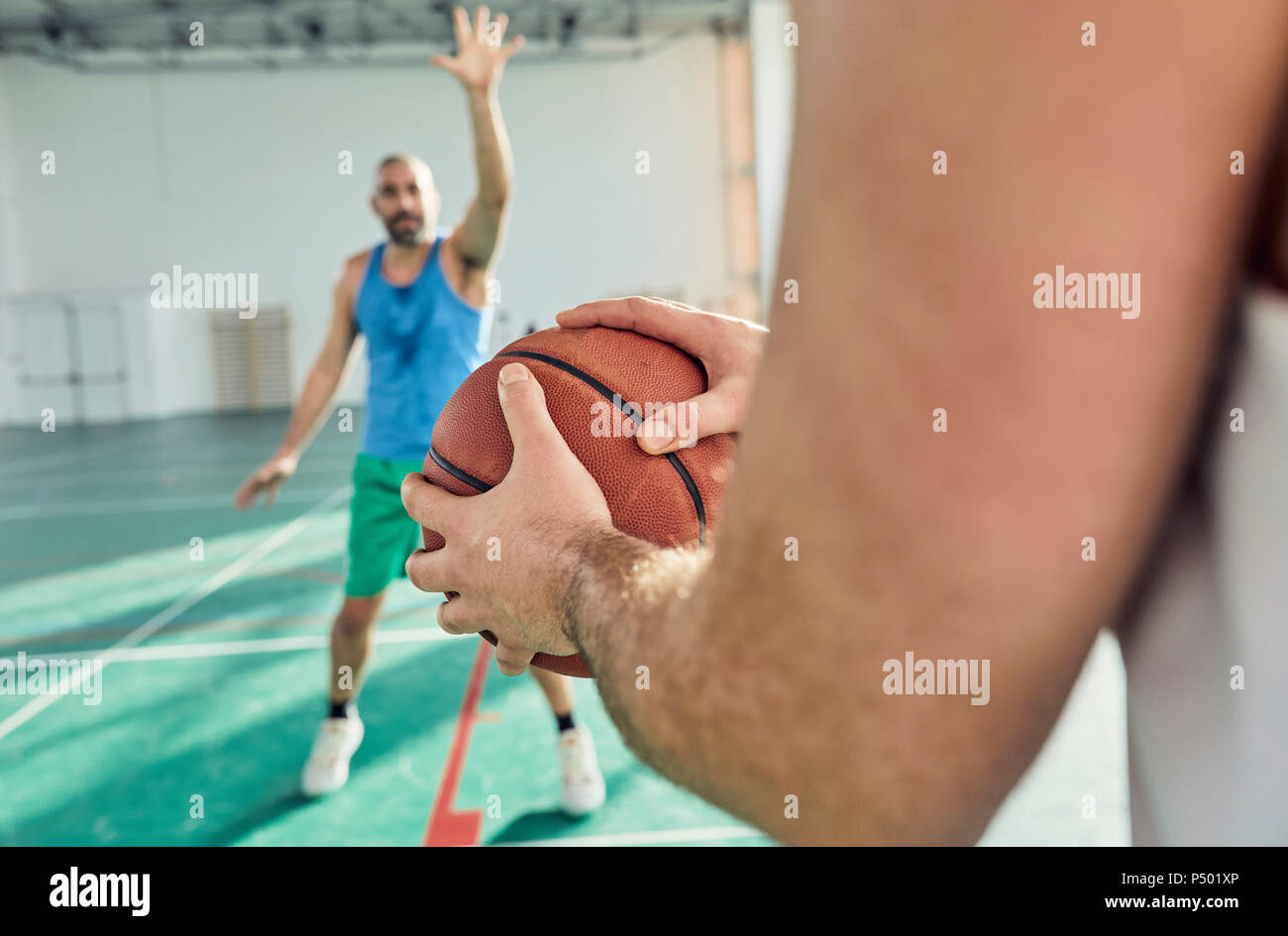 Basketball player raising arms hi-res stock photography and images - Alamy