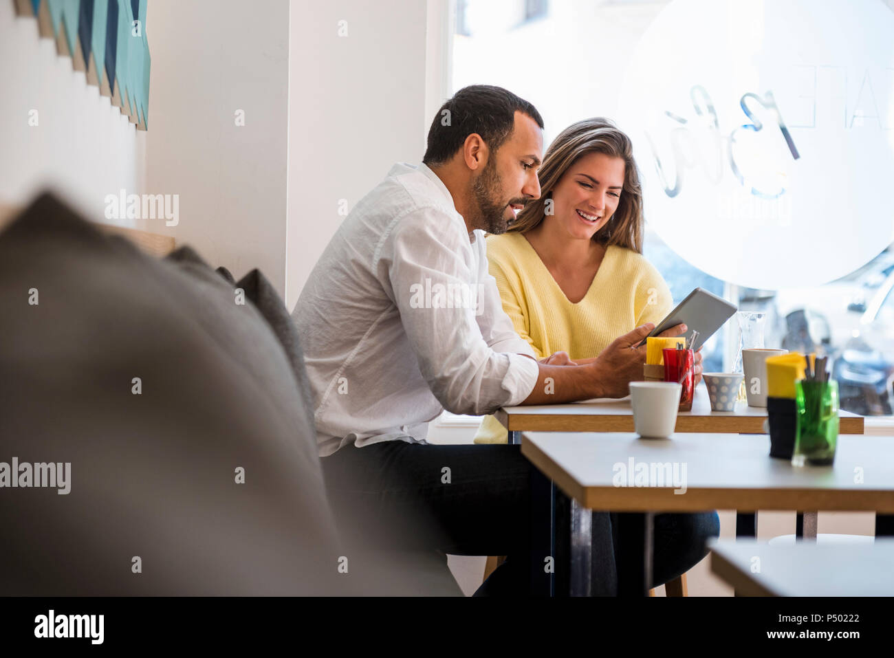Sharing coffee cafe hi-res stock photography and images - Alamy