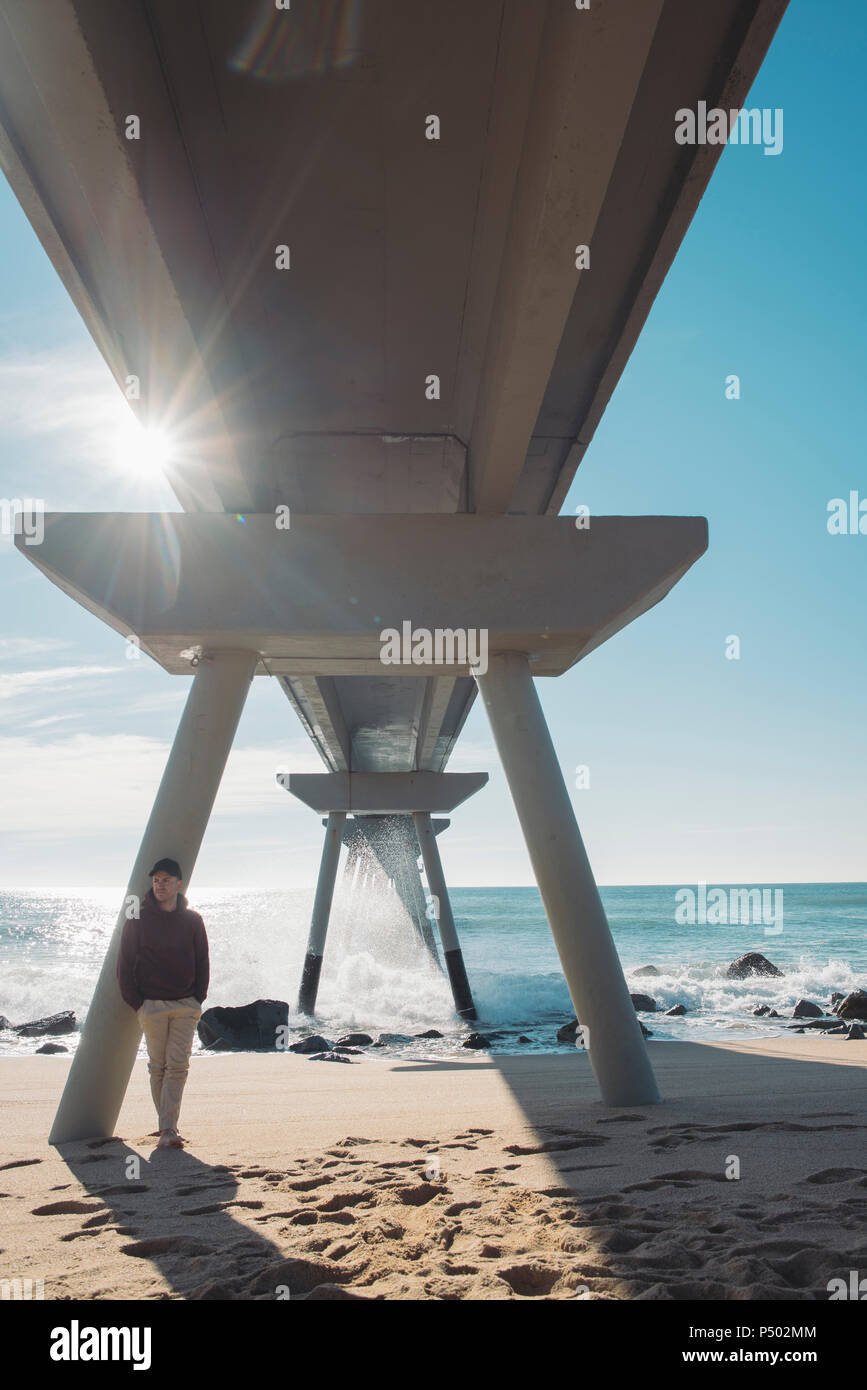 Beach man bridge hi-res stock photography and images - Alamy