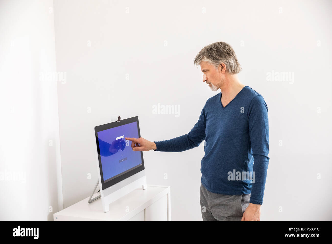 Entering pin hi-res stock photography and images - Alamy