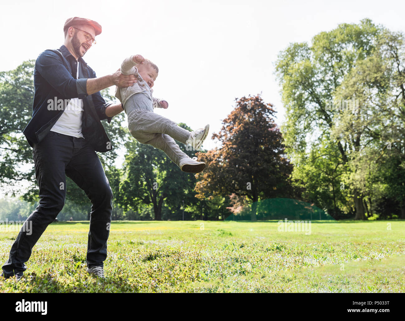 Father lifting his son hi-res stock photography and images - Alamy