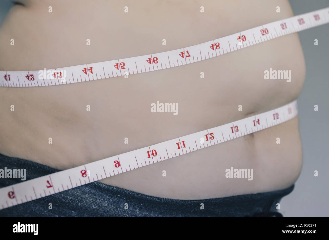 Close-up of human body and fat body, Fat body part of paunch or belly ...