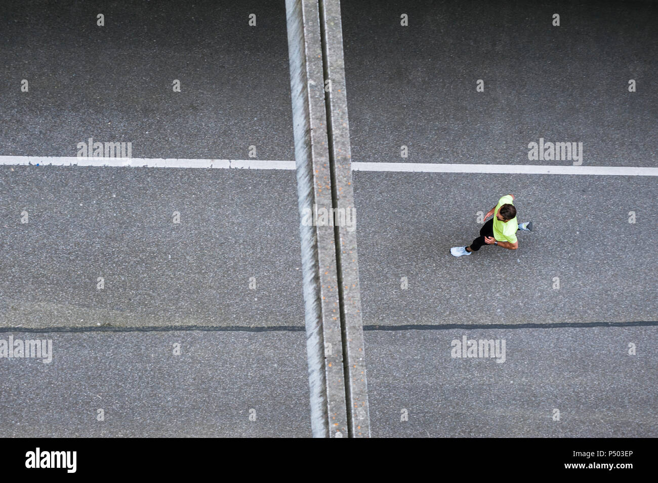 Top view of man running on a street Stock Photo - Alamy