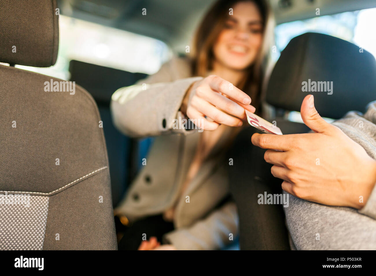 Paying taxi hi-res stock photography and images - Alamy