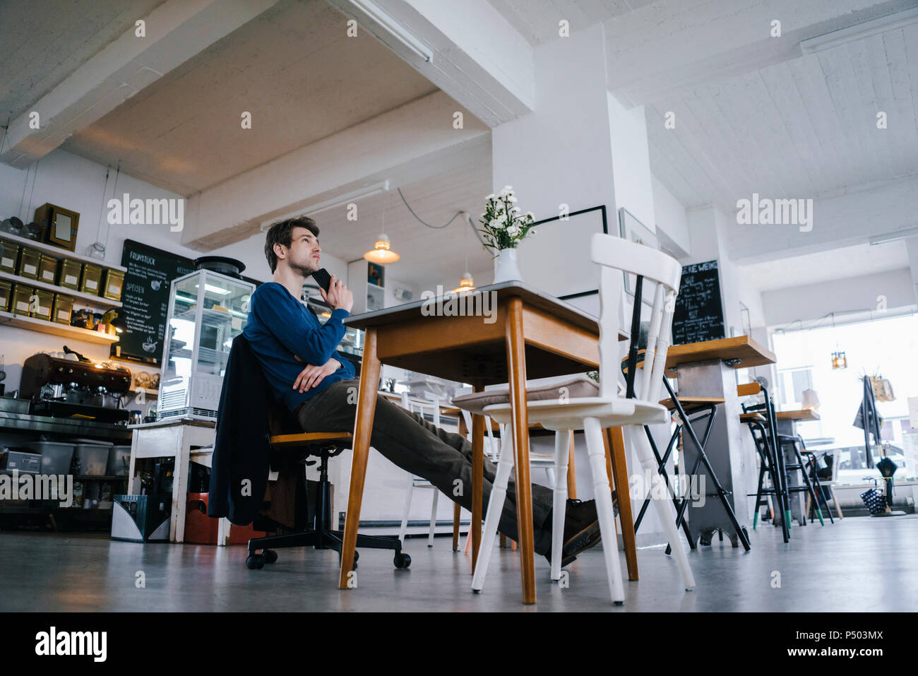 Man cafe thinking hi-res stock photography and images - Alamy