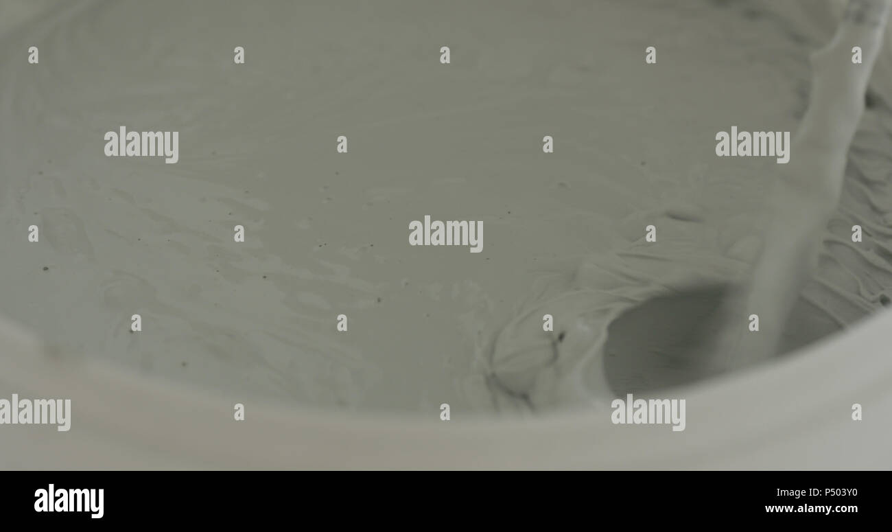 closeup mixing gray decorative concrete plaster, wide photo Stock Photo ...