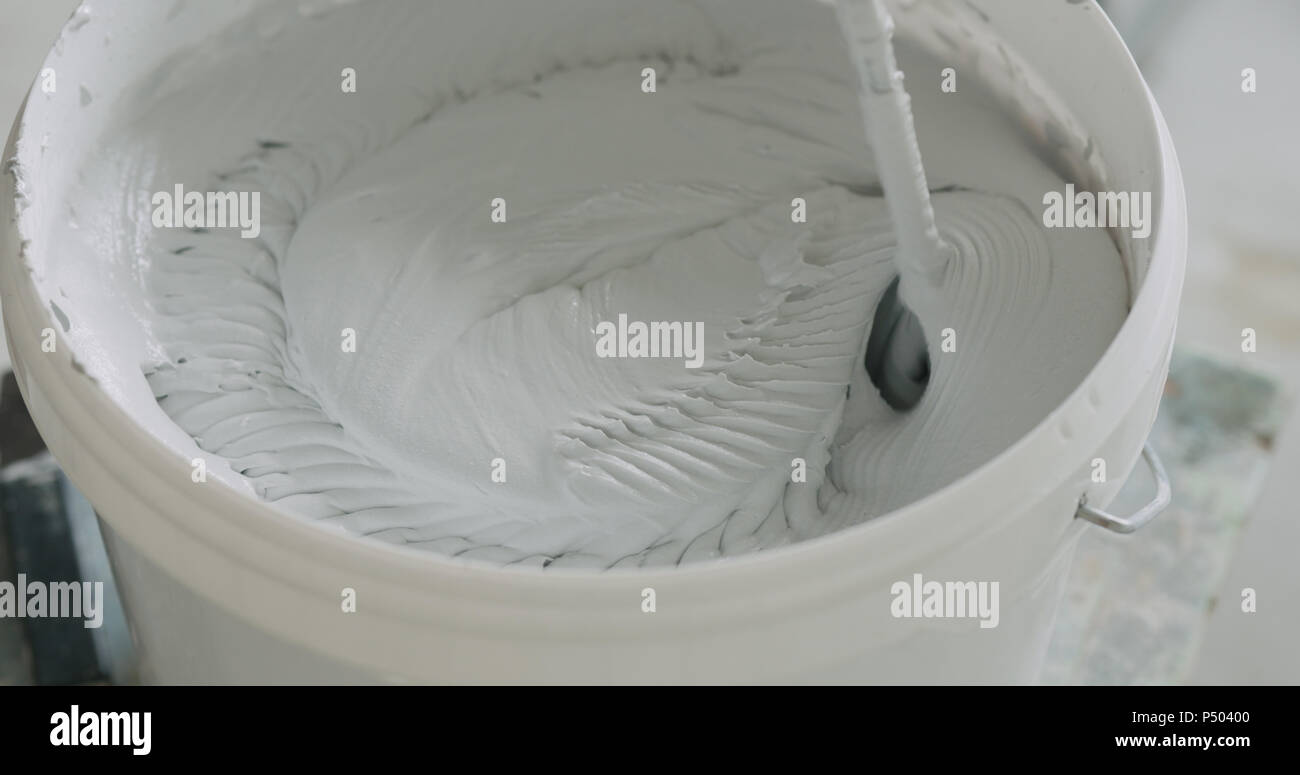 Mixing plaster hi-res stock photography and images - Alamy