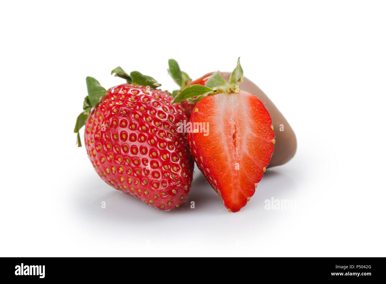 Fresh ripe strawberry covered with milk chocolate isolated on white ...