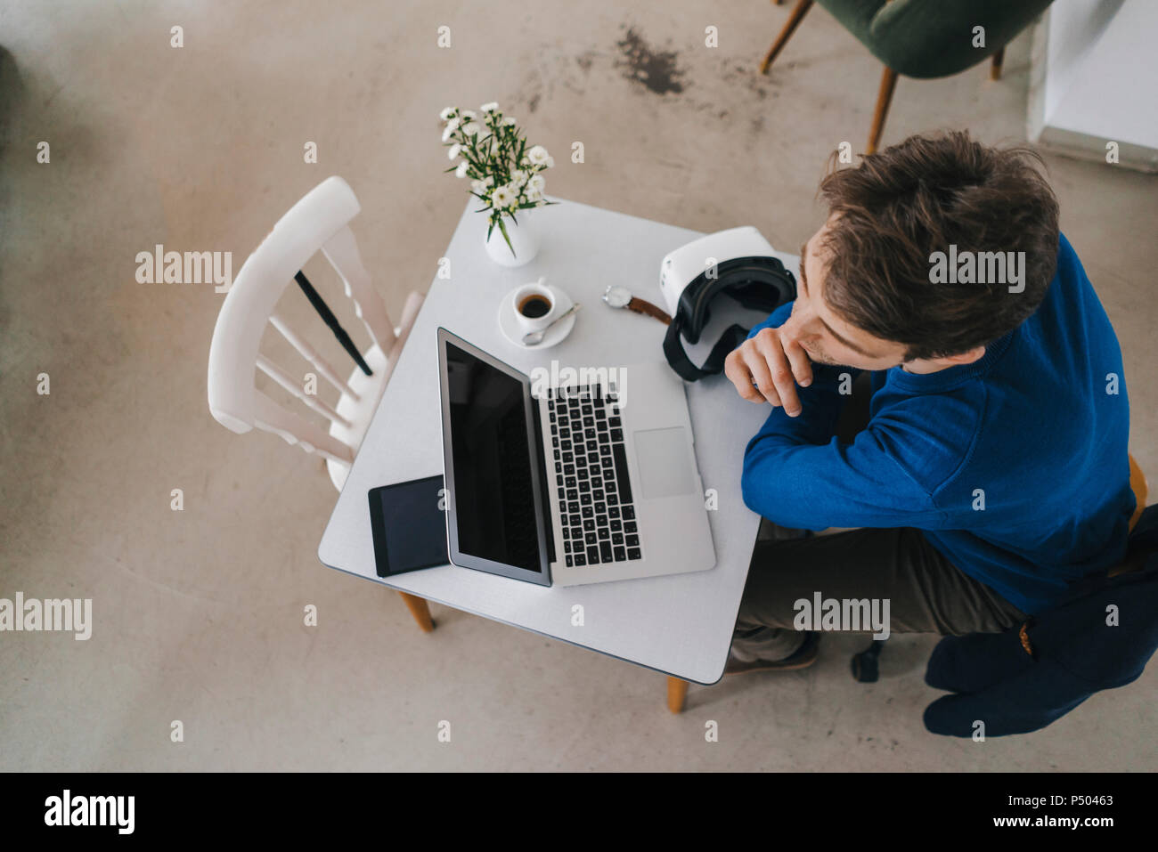 Man sitting table cafe laptop vr glasses hi-res stock photography and ...