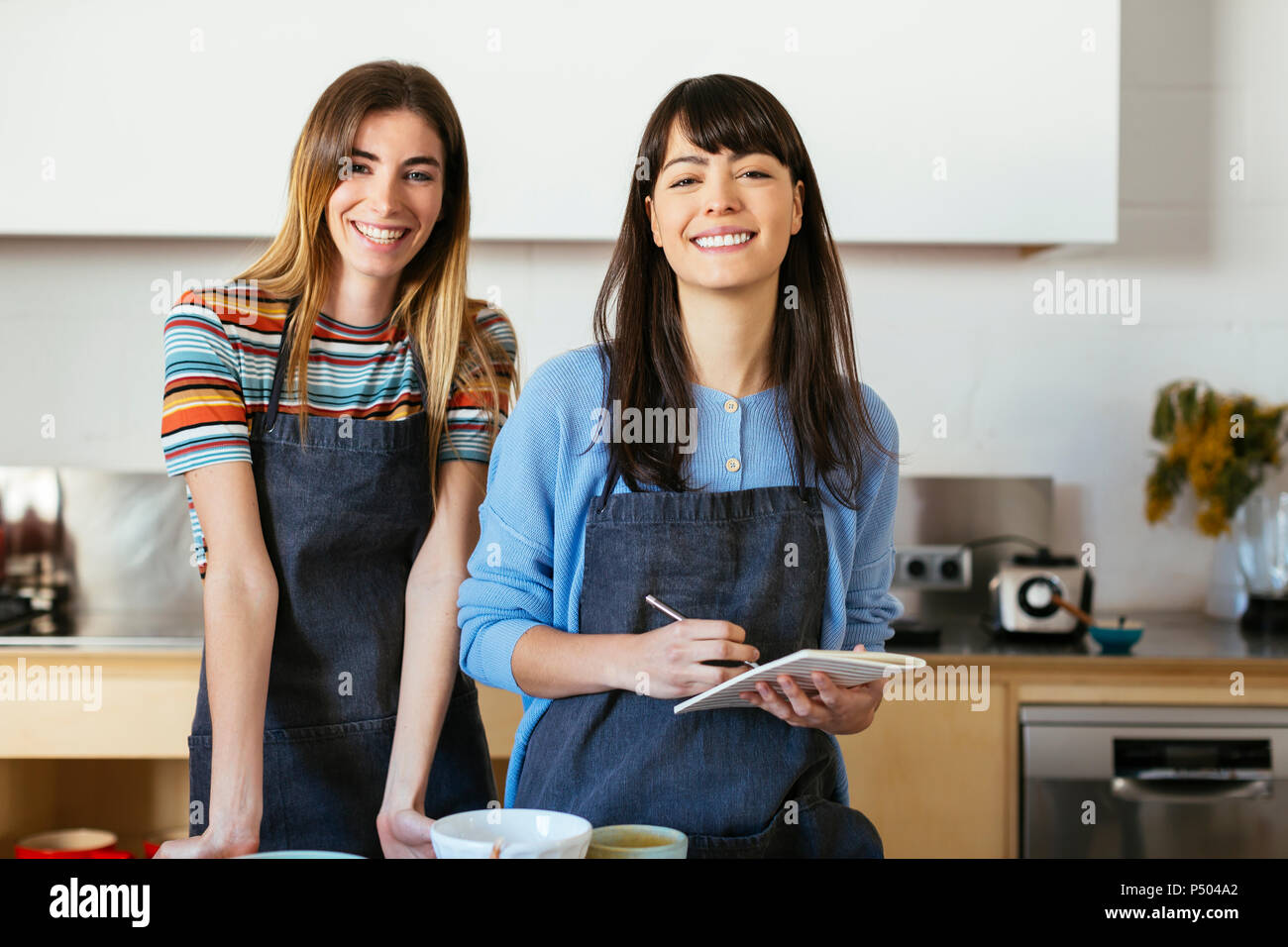 Kitchen two women hi-res stock photography and images - Alamy