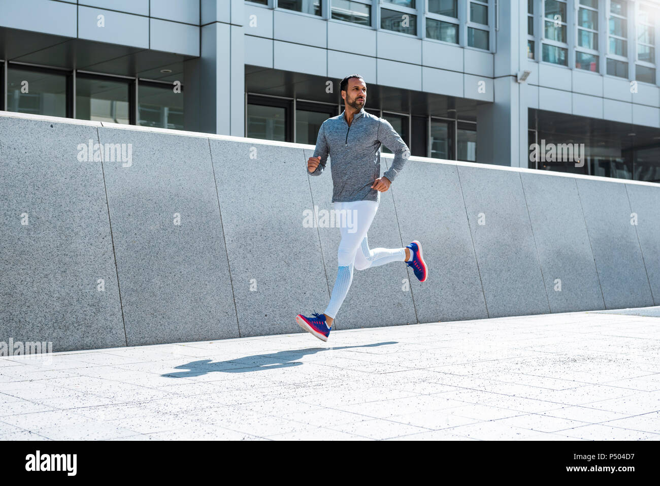 Man running hi-res stock photography and images - Alamy