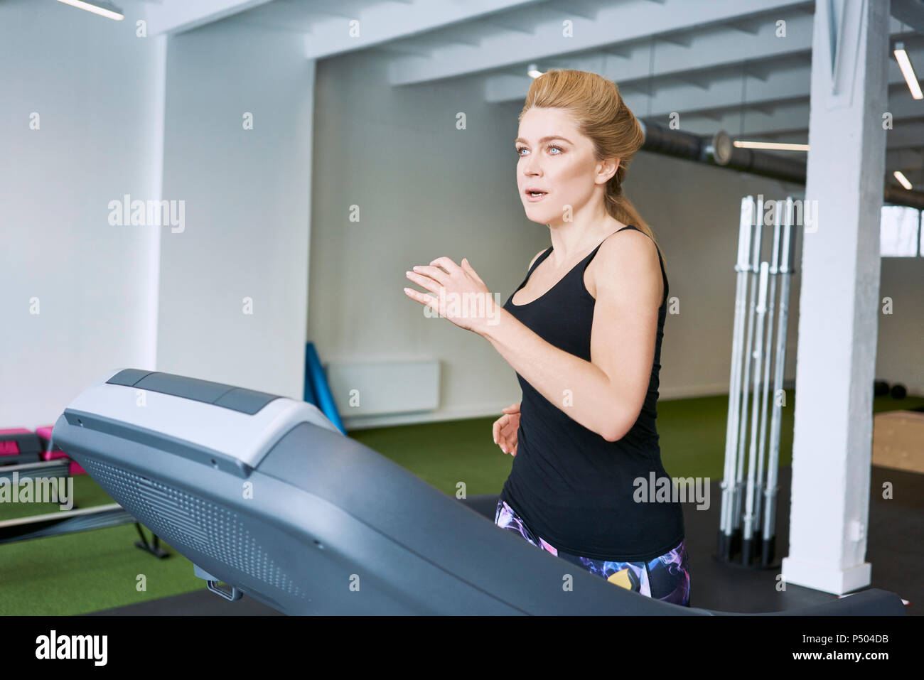 Woman Running Treadmill High Resolution Stock Photography and Images ...