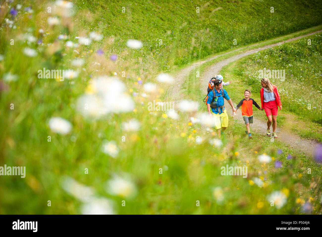 Family hiking in rural landscape Stock Photo - Alamy