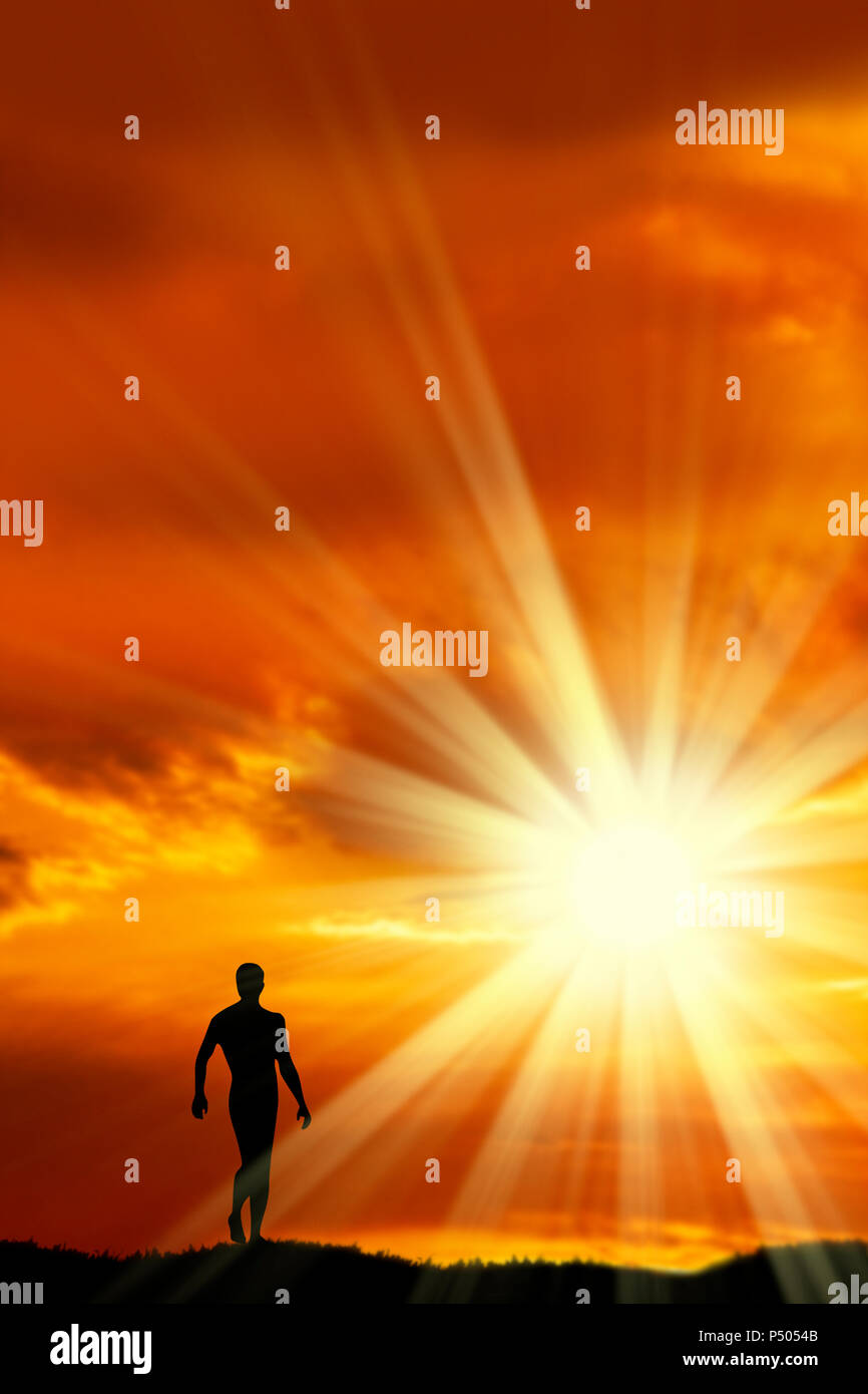an image of man walking at sunset Stock Photo - Alamy