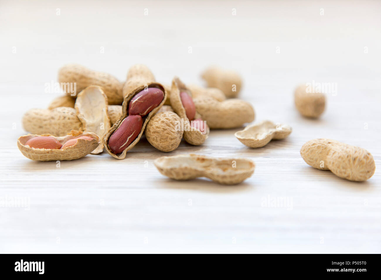 Peanuts in shells, closeup Stock Photo - Alamy