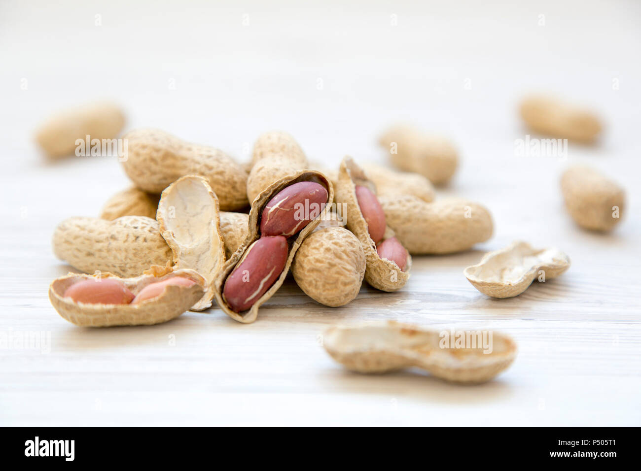 Raw peanuts shells in white hi-res stock photography and images - Alamy