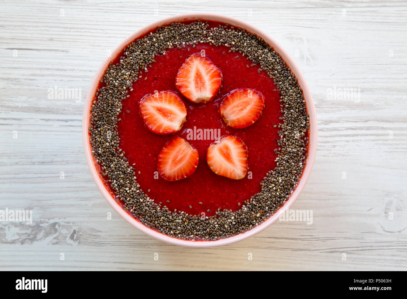 Top view, bowl of strawberry smoothie with chia seeds. From above Stock ...