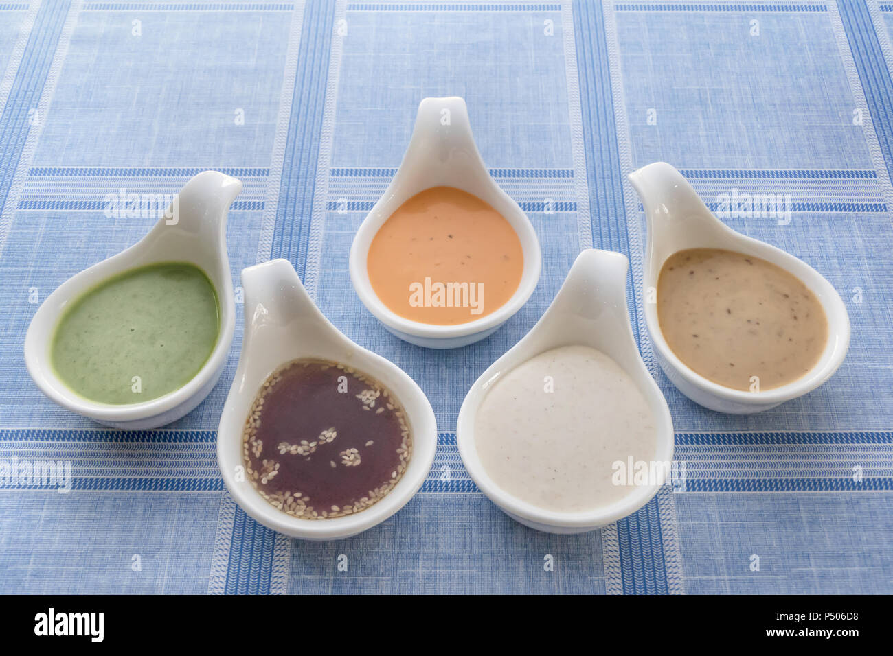 different homemade cream sauce of salad in spoon Stock Photo - Alamy