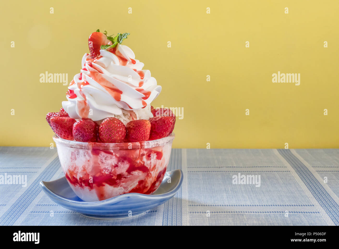 Bingsu - Korean shaved ice dessert with sweet toppings with strawberry ...