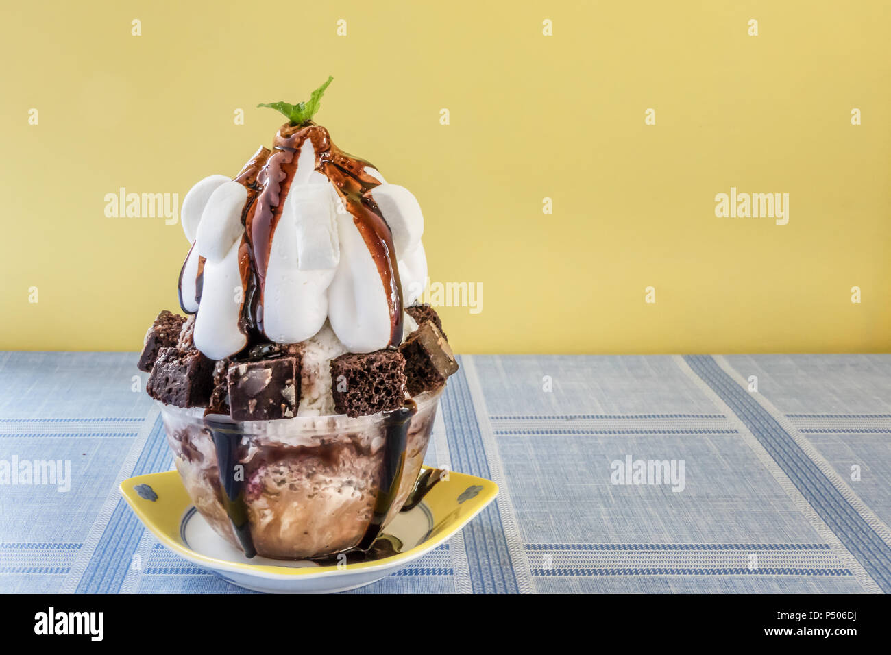 Bingsu - Korean shaved ice dessert with sweet toppings with chocolate ...