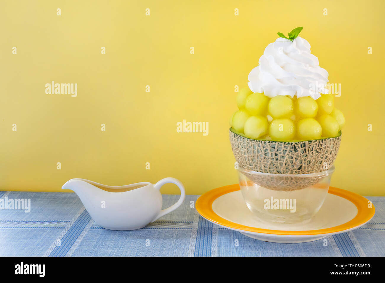 Bingsu - Korean shaved ice dessert with sweet toppings with fresh melon ...