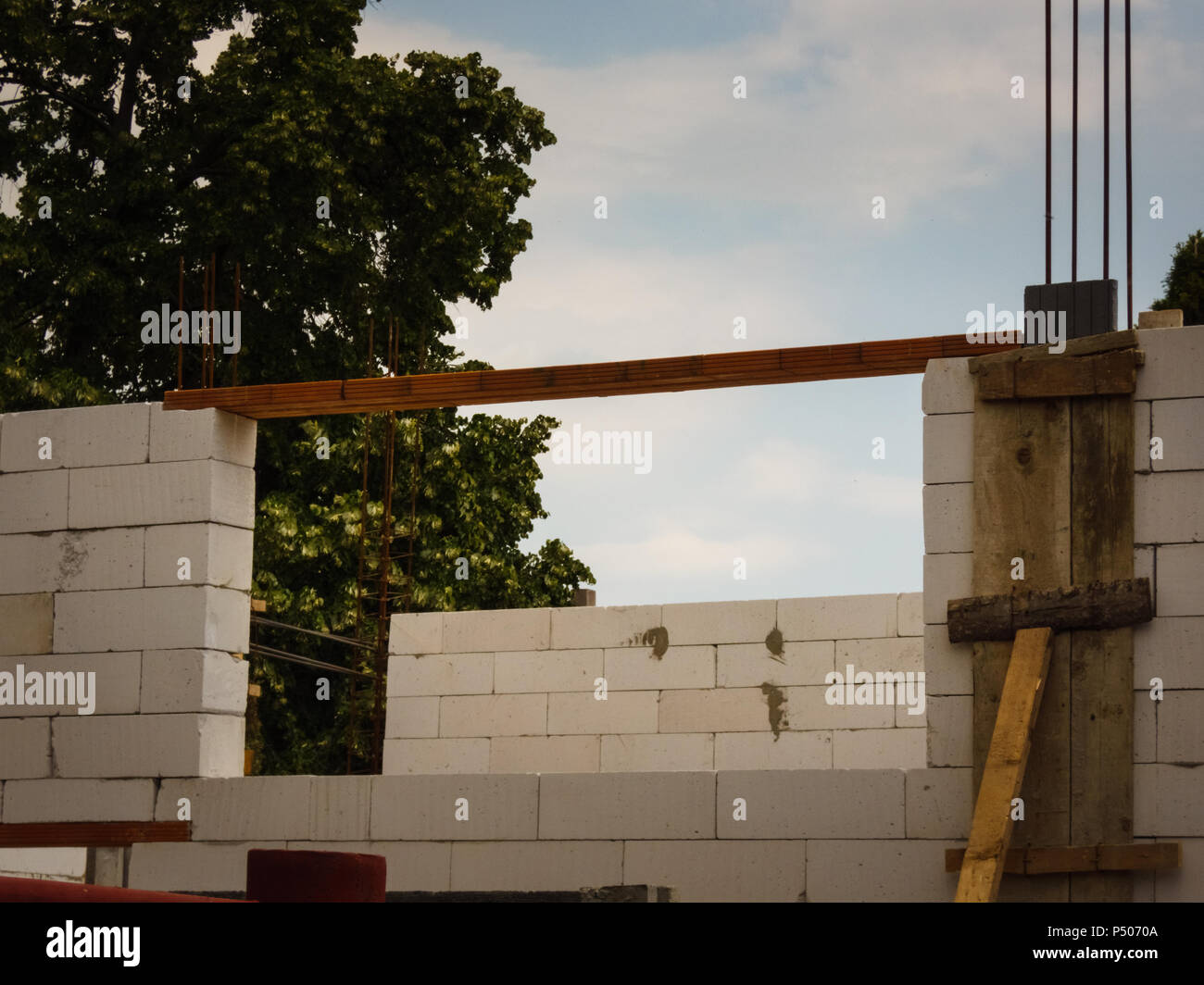 Small construction site. Future window frame. Lintel. Easy cellular ...