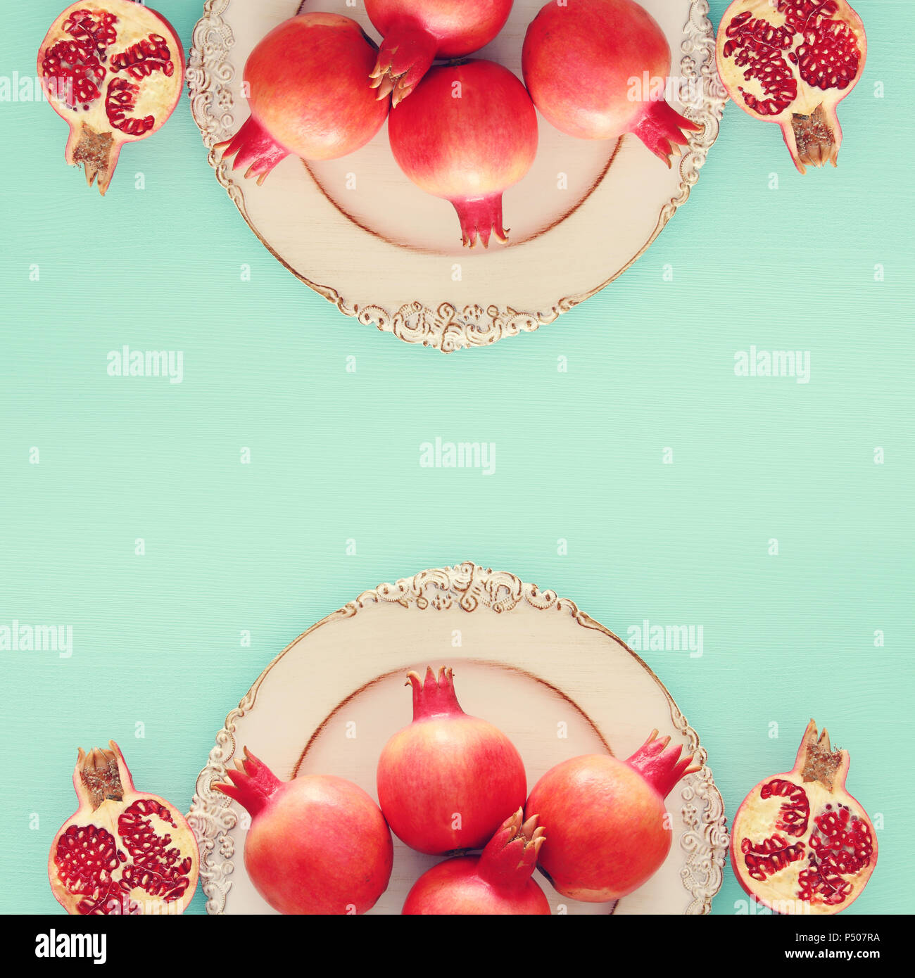Rosh hashanah (jewish New Year holiday) concept. Pomegranate raditional ...