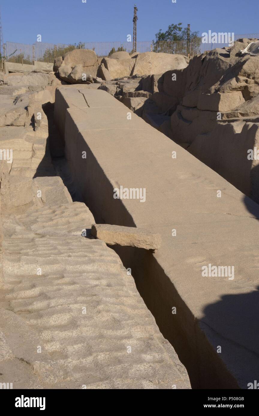 Egypt. Aswan. The unfinished obelisk in a granite quarry. The bottom ...