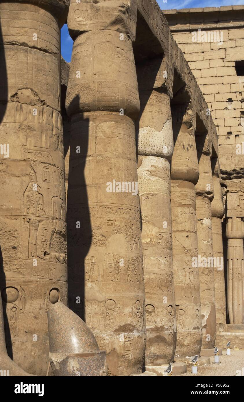 Temple of Luxor. First courtyard called the Ramses II surrounded with ...