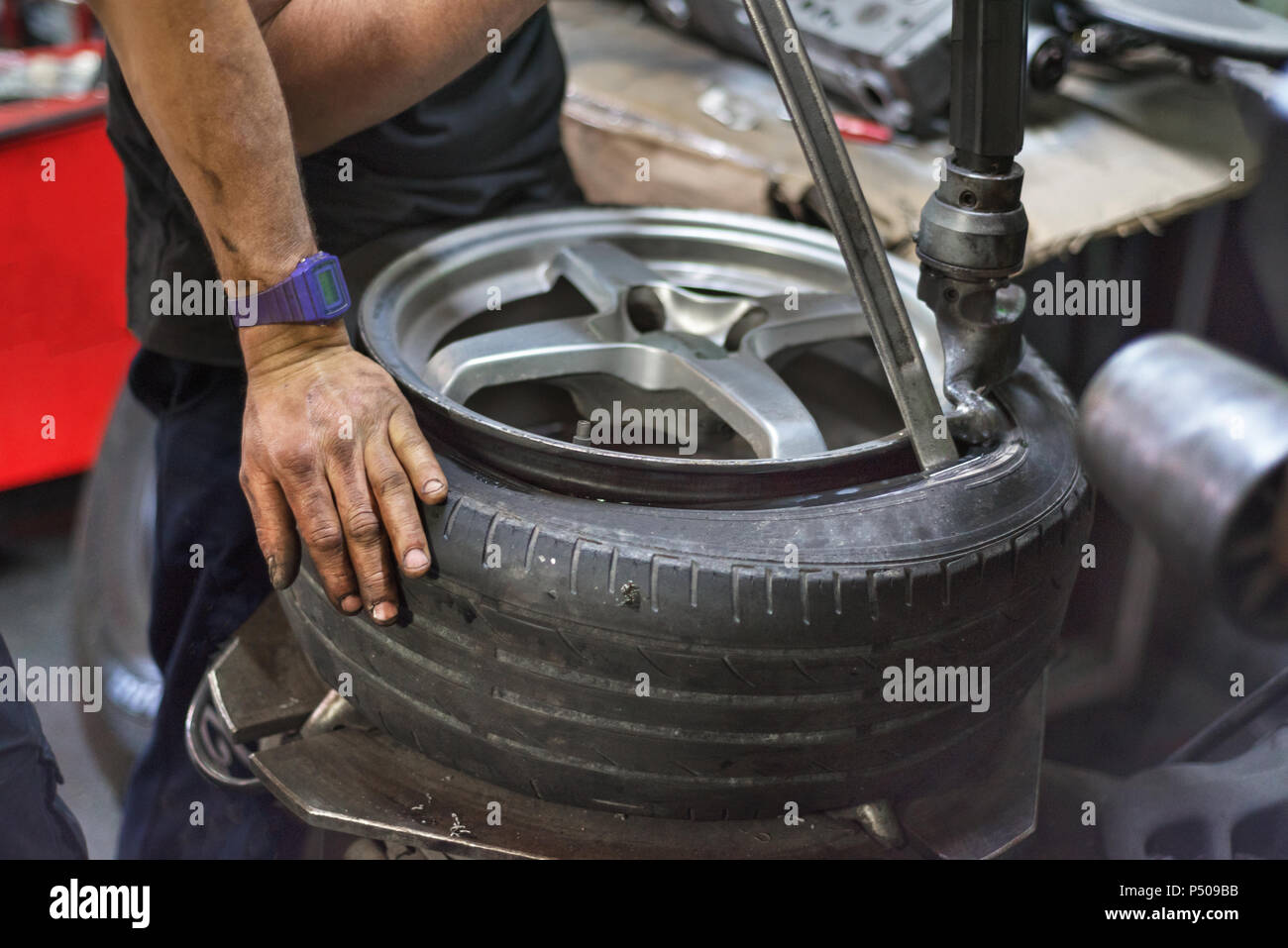 Fitting Car Tyre High Resolution Stock Photography and Images - Alamy