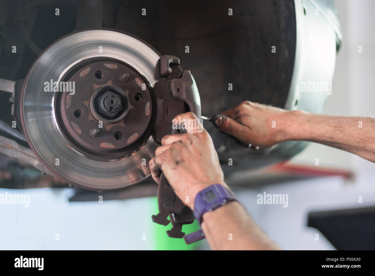 Brake mechanic hi-res stock photography and images - Alamy