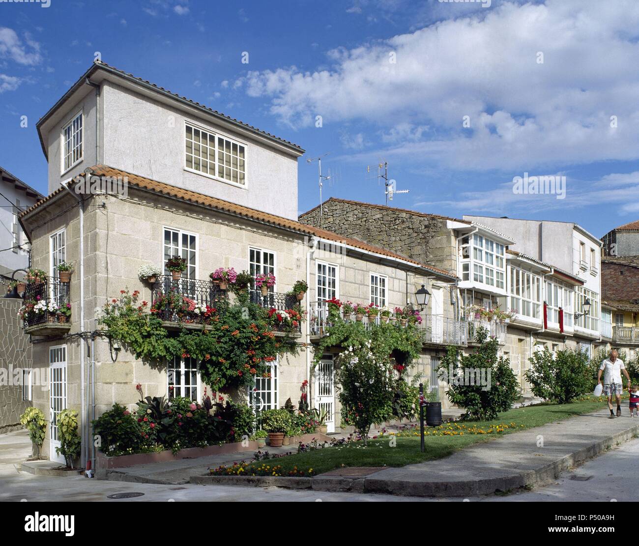 Spain. Galicia. Allariz. Typical stone-built houses in the Rua Nova, in ...