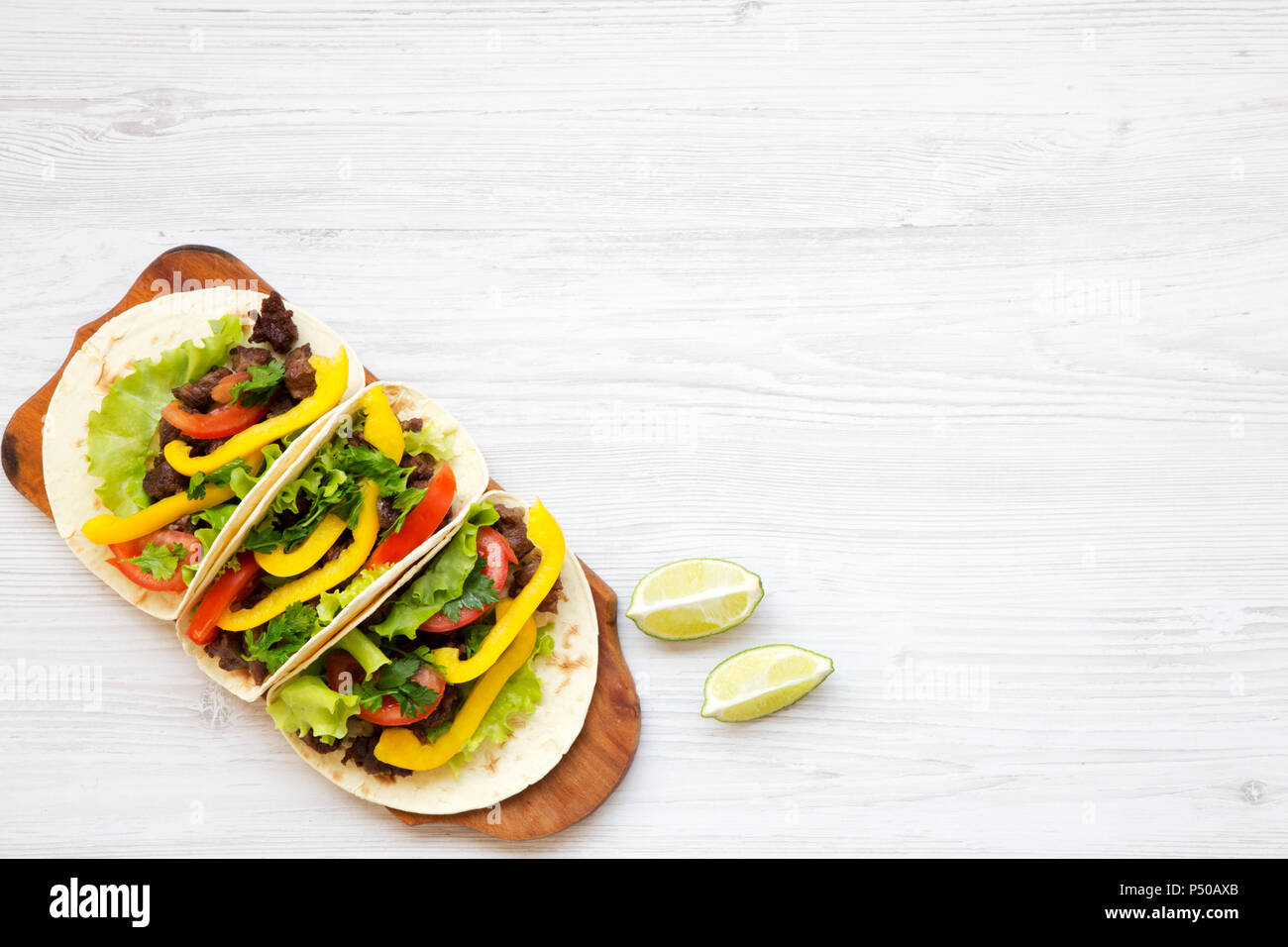 Beef tacos with salad and pepper. Top view. From above, overhead. Copy ...