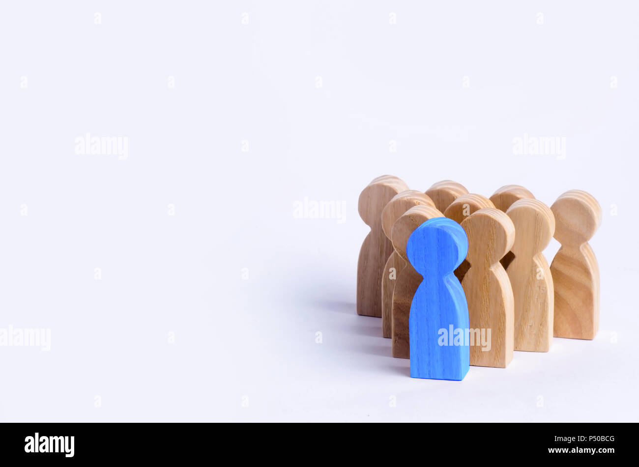 People stand in the formation of the pins. A game of bouwling. Wooden ...