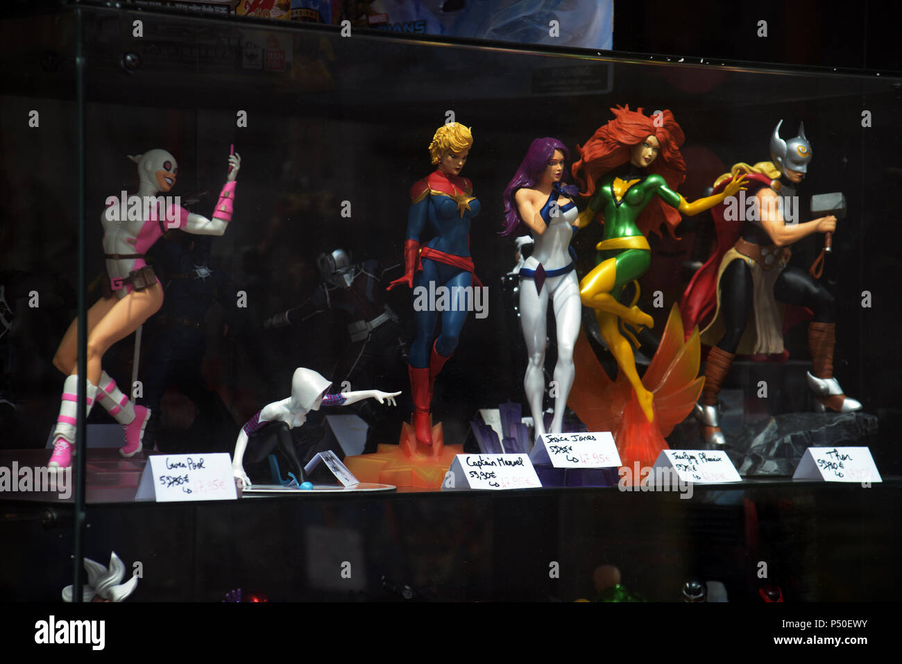 Childrens toy superheros on display in a toyshop window in Le Mans ...