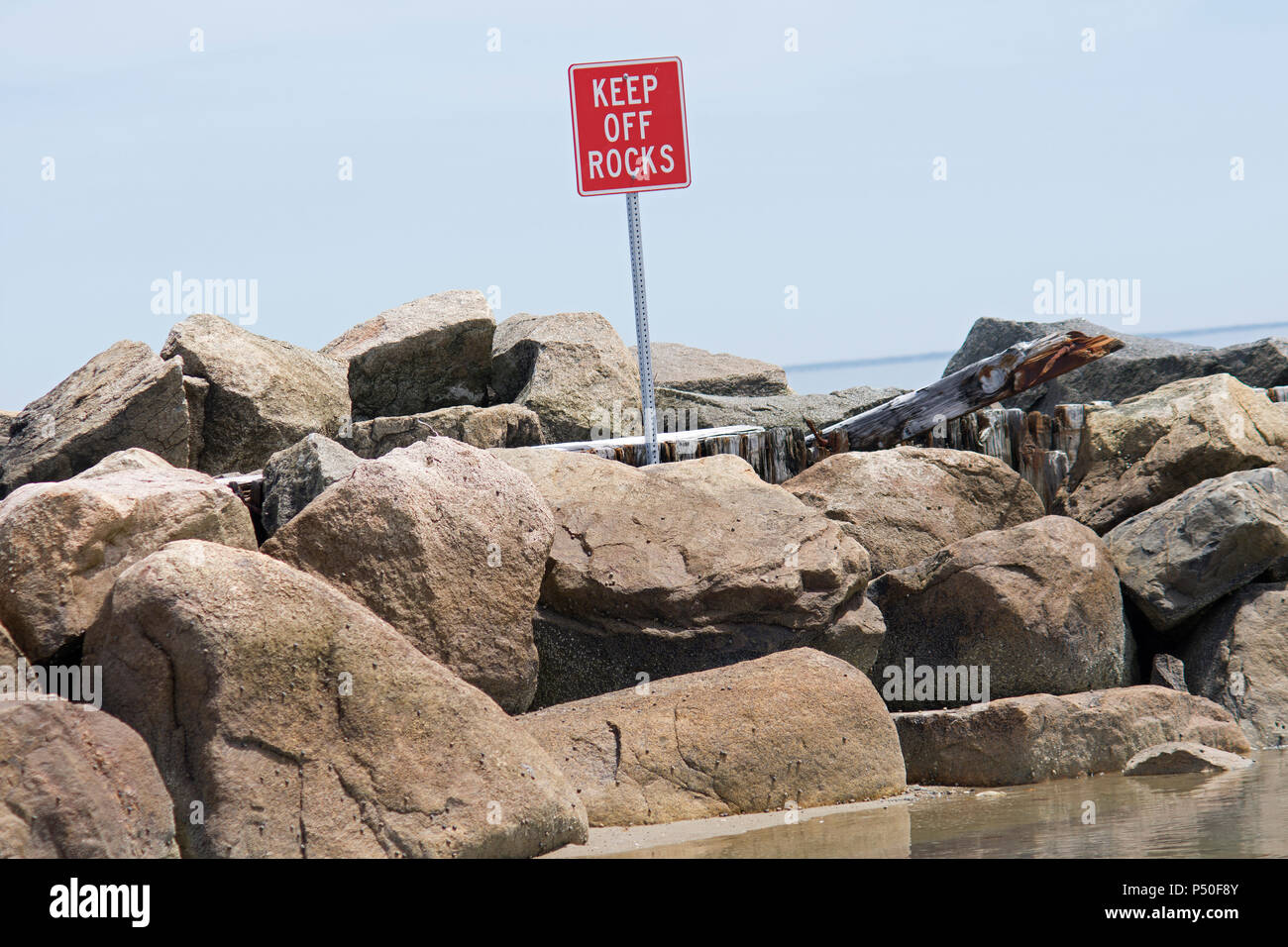 Signage on the jetty at Corporation Beach on Cape Cod, USA Stock Photo ...