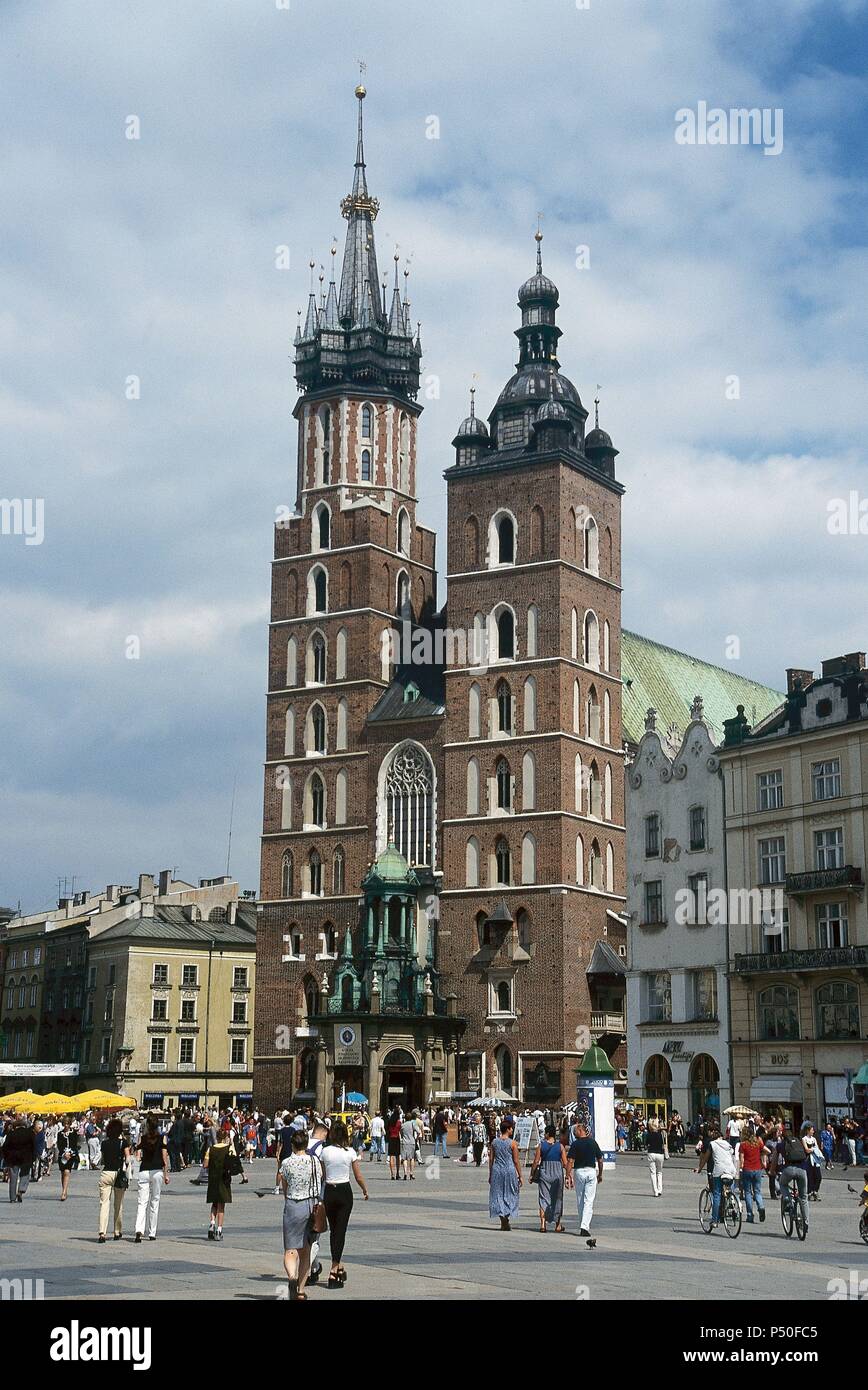 POLAND. KRAKOW. View of the Central Market Square with Saint Mary ...