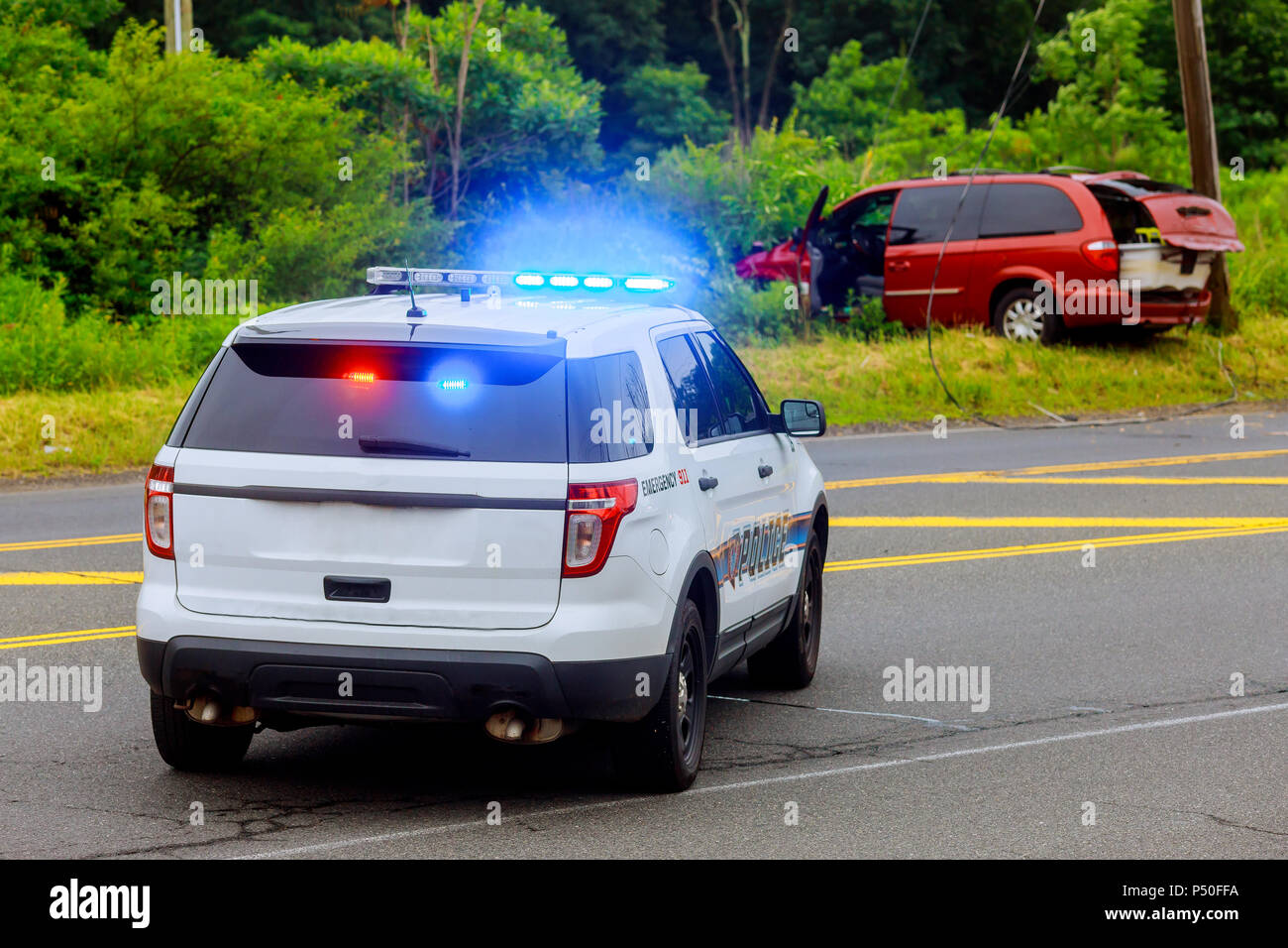 Police flashing blue lights at accident damaged car Stock Photo - Alamy