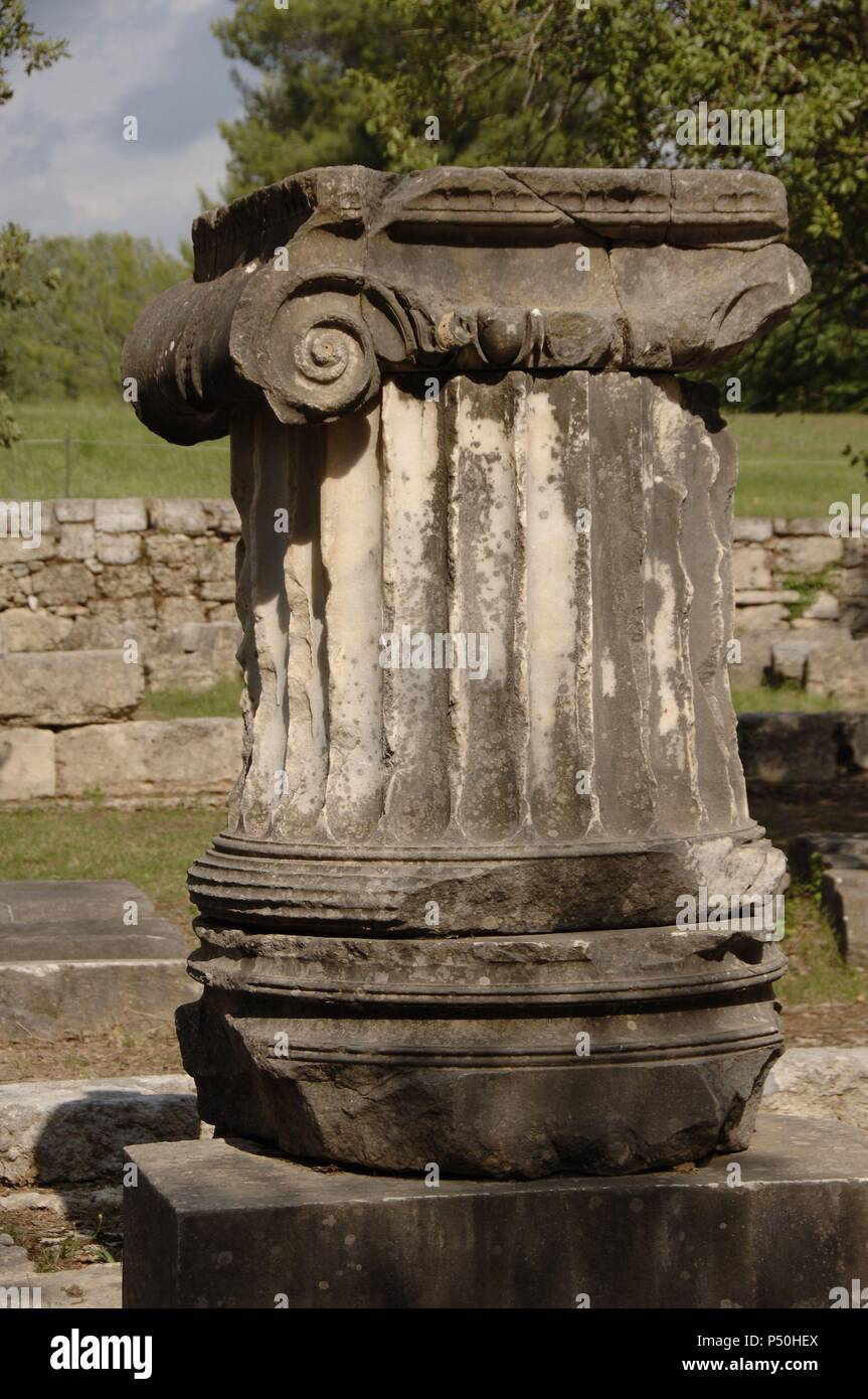 Ionic order. Chapiter with volute. Shaft fluted. Ruins. Olympia, Greece ...