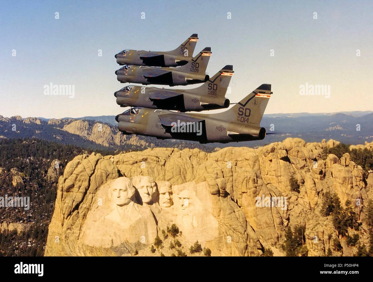 175th Tactical Fighter Squadron A-7D Corsair IIs fly past Mount ...