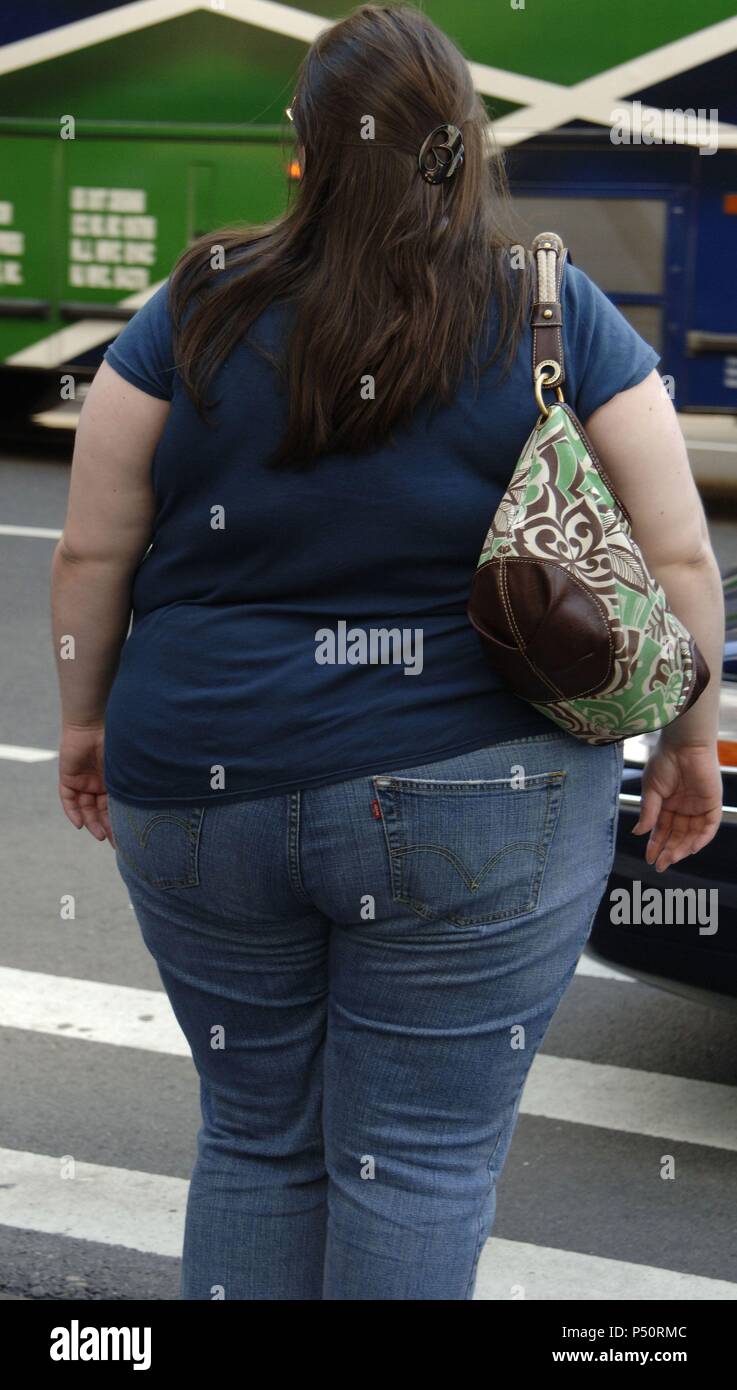 Obese woman down the fifth avenue. New York. USA Stock Photo - Alamy