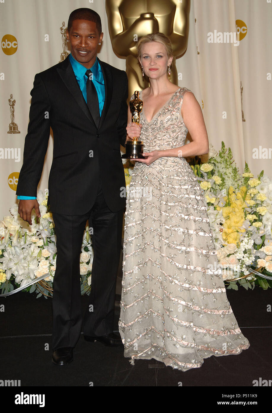 Reese Witherspoon & Jamie Fox in the press room at the 78th Annual ...