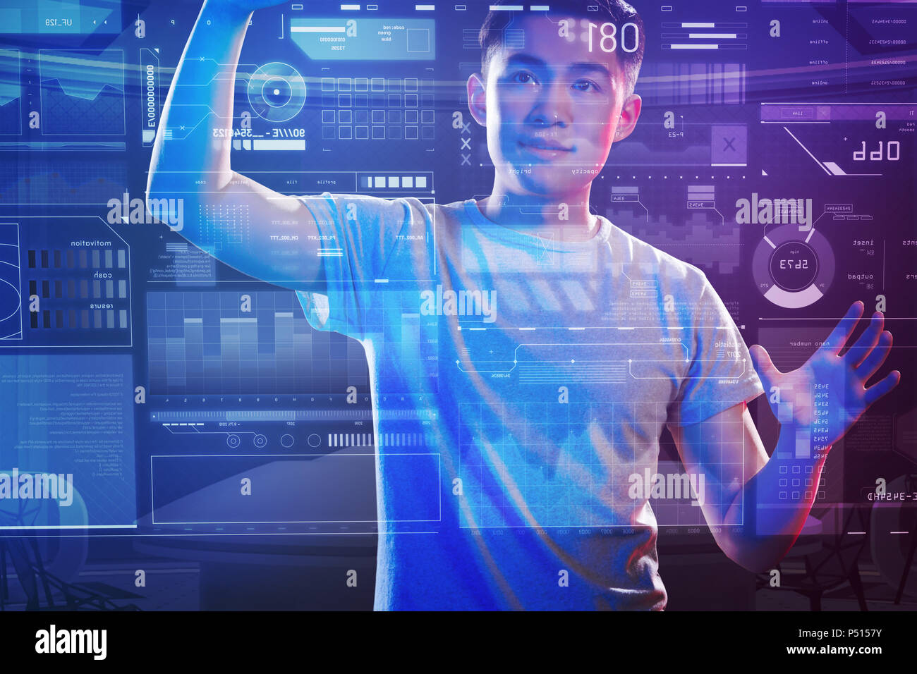 Clever programmer enjoying his work and touching the transparent screen ... Clever programmer enjoying his work and touching the transparent screen ...